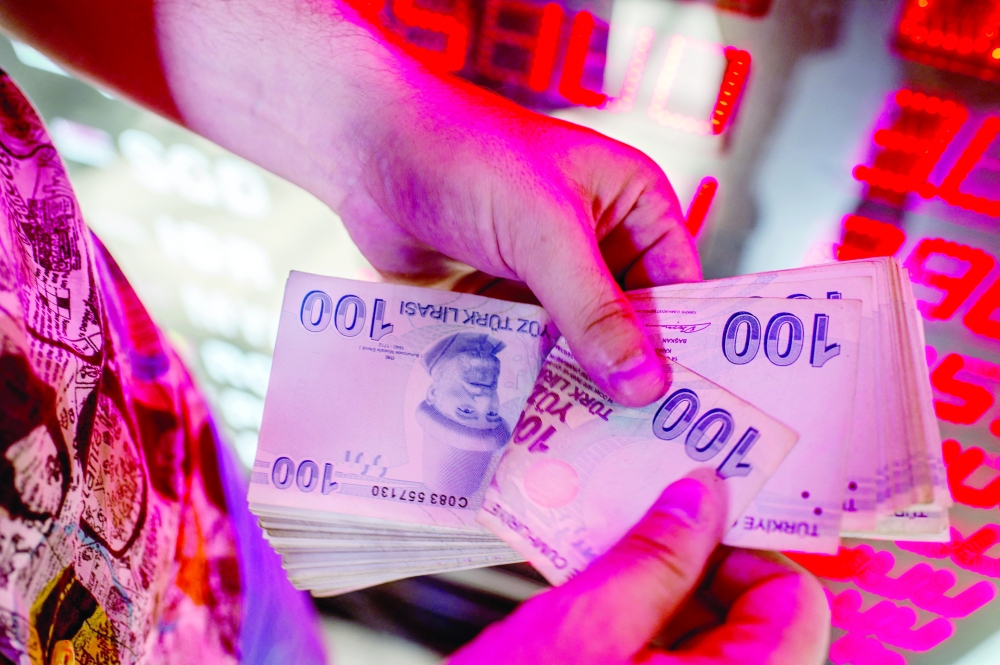 Turkey stuns markets by cutting rate despite soaring inflation - Oman ...