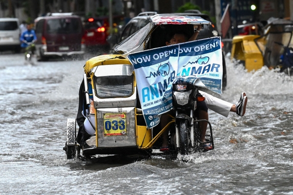 Tropical storm batters Manila before exit - Oman Observer