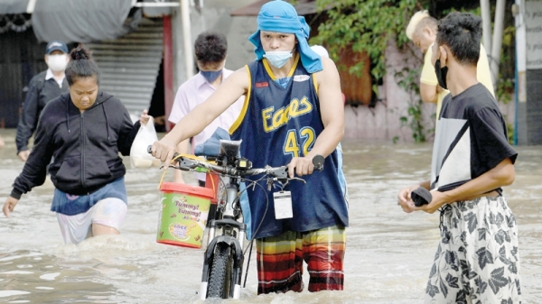 Tropical Storm ‘Nalgae’ batters Philippines capital before exit - Oman ...