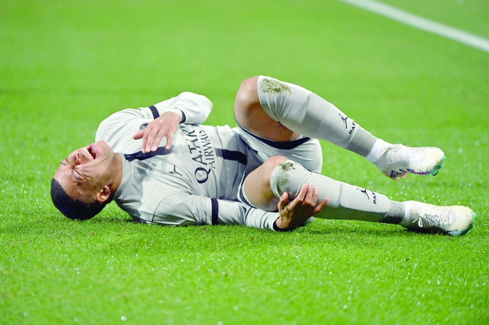 PSG lose injured Mbappe for first leg of Bayern Champions League tie ...