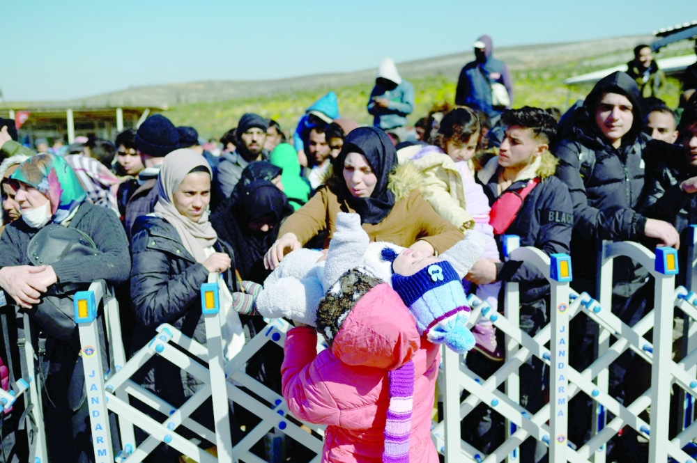 Syrian refugees flock to border to flee Turkiye quake wreckage - Oman ...