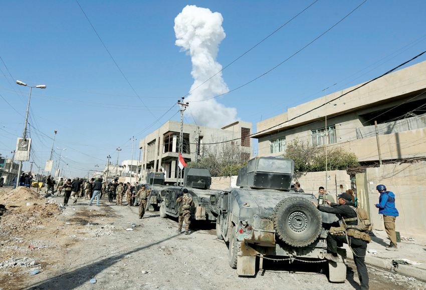 Bombed Mosul bridge still lifeline for long-suffering civilians - Oman ...