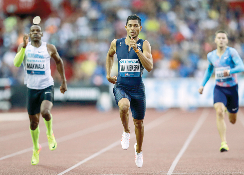 Bolt holds on to win 100 metres, Niekerk breaks 300m record - Oman Observer