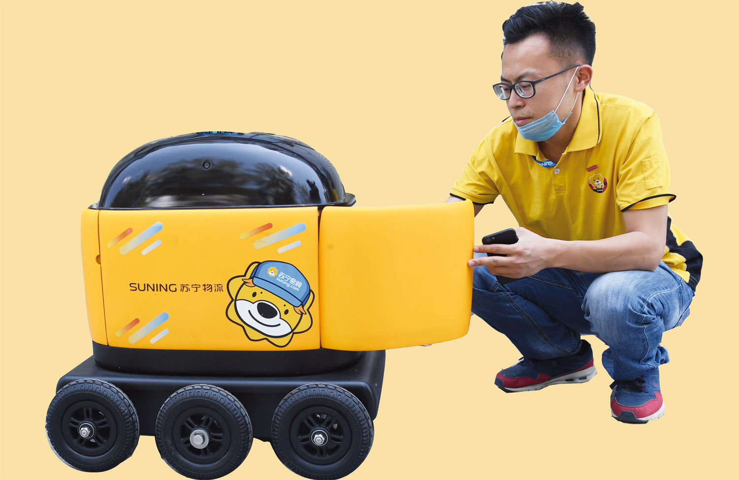 Yellow robots deliver snacks to homes in China - Oman Observer