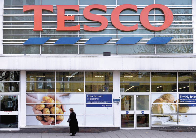 UK retailer Tesco profit dives by third - Oman Observer