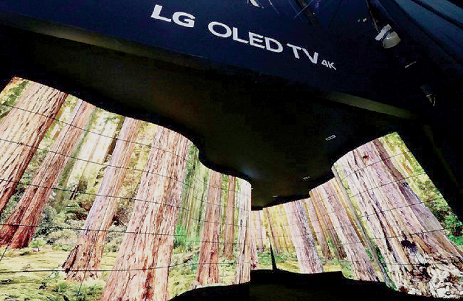 LG to launch OLED TV that rolls out like poster in 2019 - Oman Observer