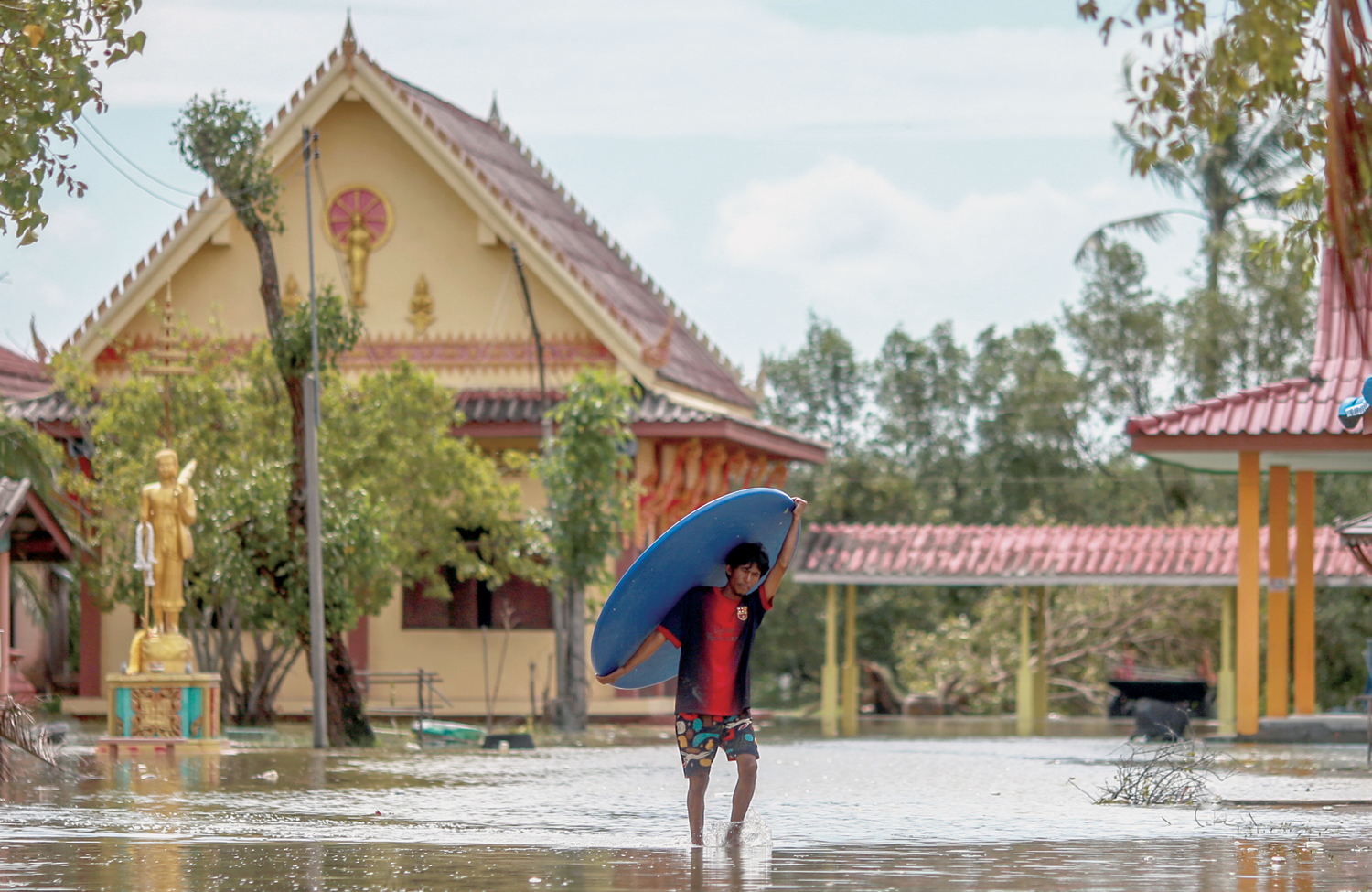 Thailand resumes flights and ferry services as tropical storm slows ...