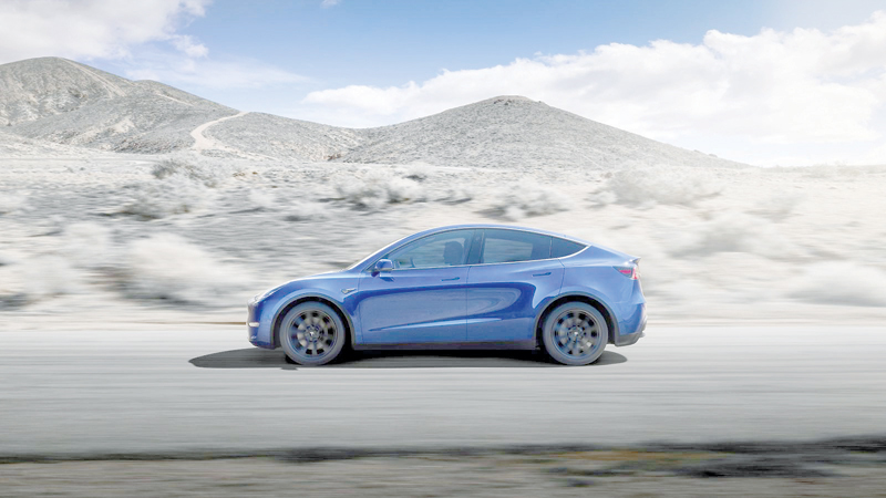 Tesla unveils Model Y as EV vehicle race heats up, price starts at ...