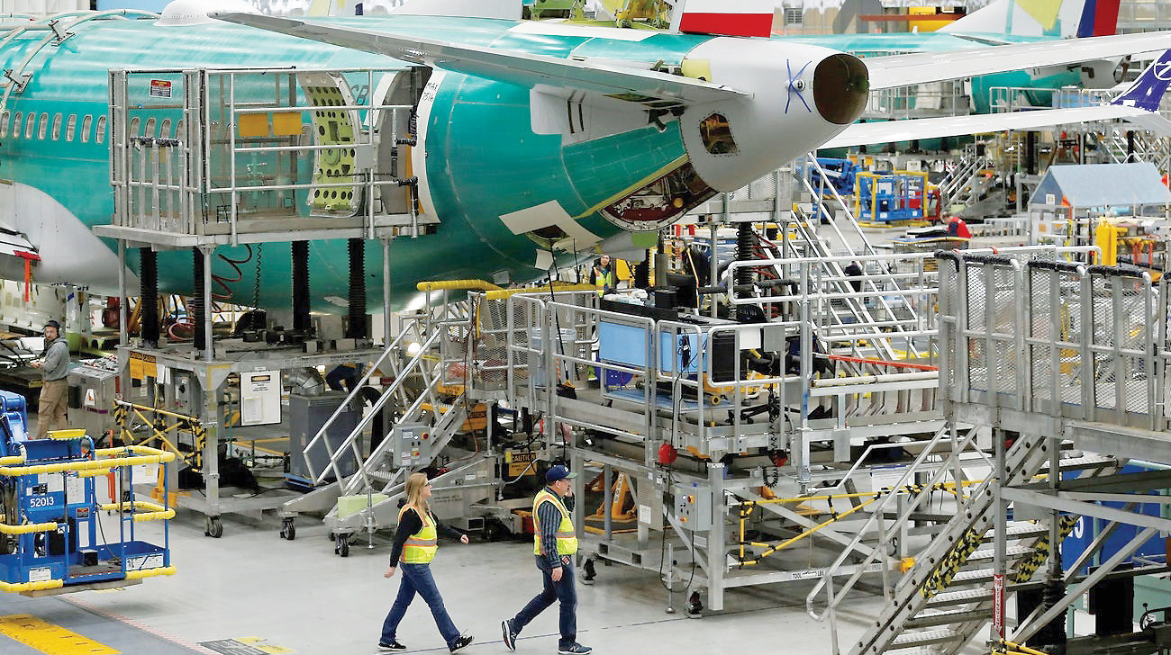 Boeing to reassign 3,000 workers as it halts production of 737 MAX ...