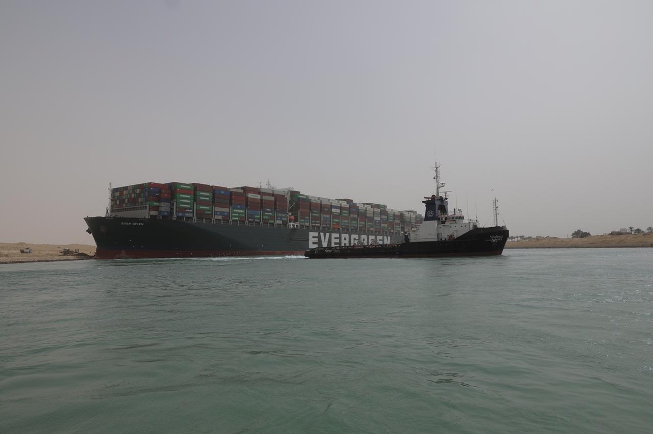 Suez Canal suspends traffic as bid to refloat grounded ship hits ...