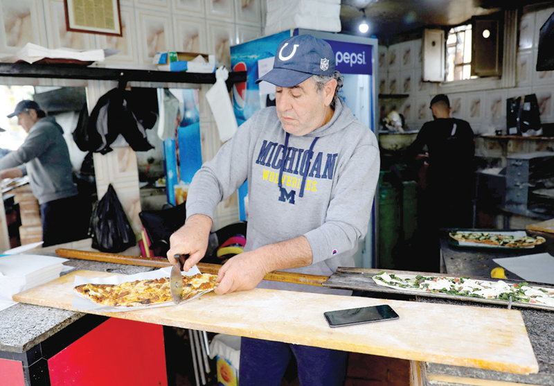 Traditional manousheh leaves tables in poverty-hit Lebanon - Oman Observer